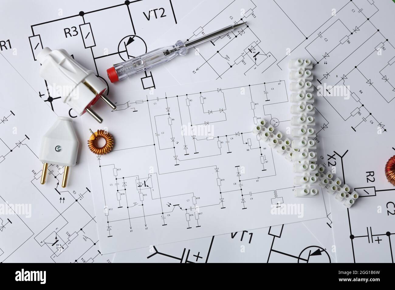 Different electrical tools on paper circuit drawing background Stock ...