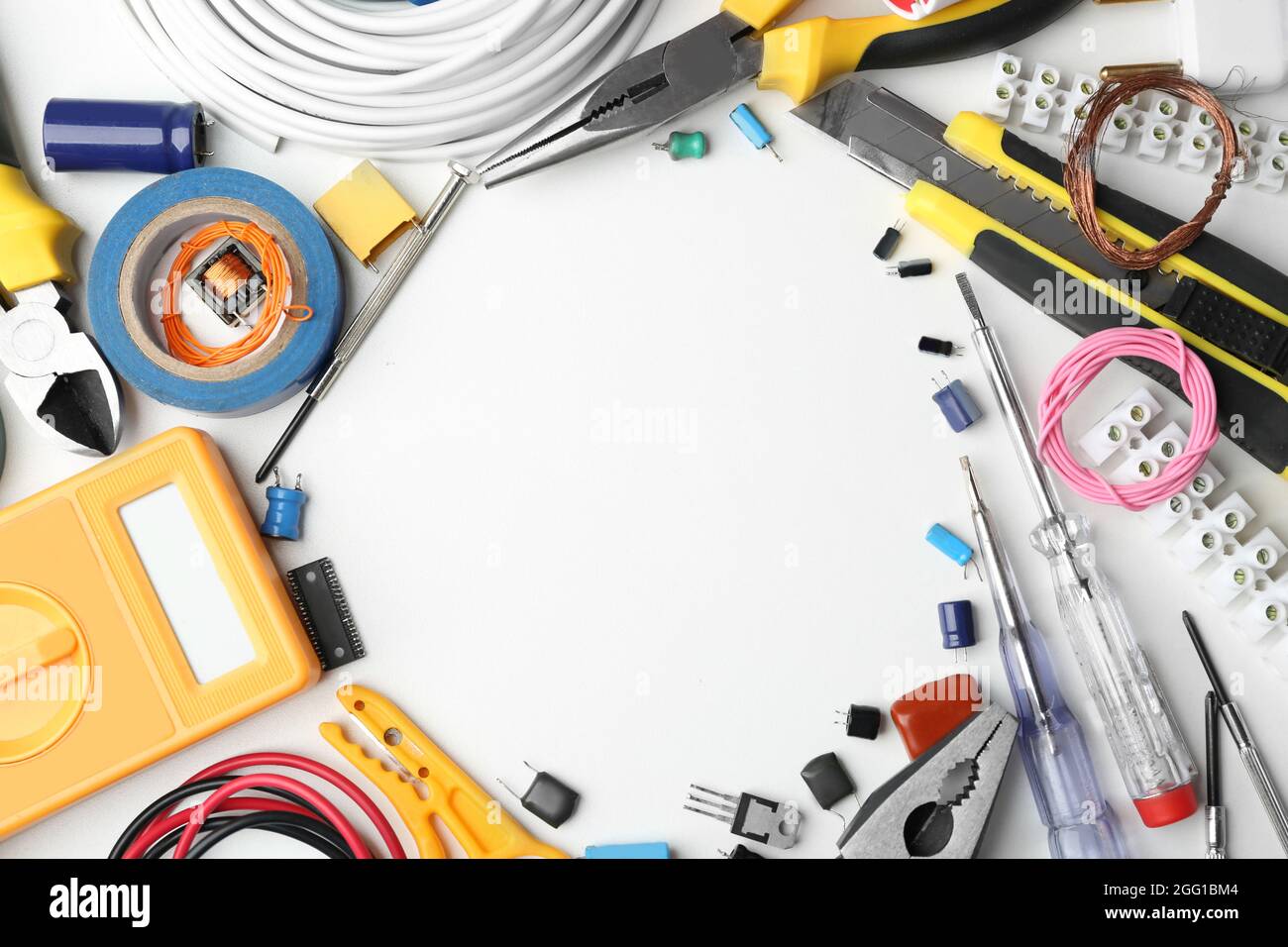 Different electrical tools on white table, top view Stock Photo - Alamy