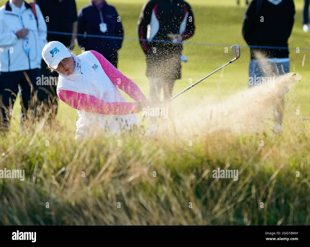 Team GB&I's Hannah Darling plays from a bunker on the 1st hole during ...