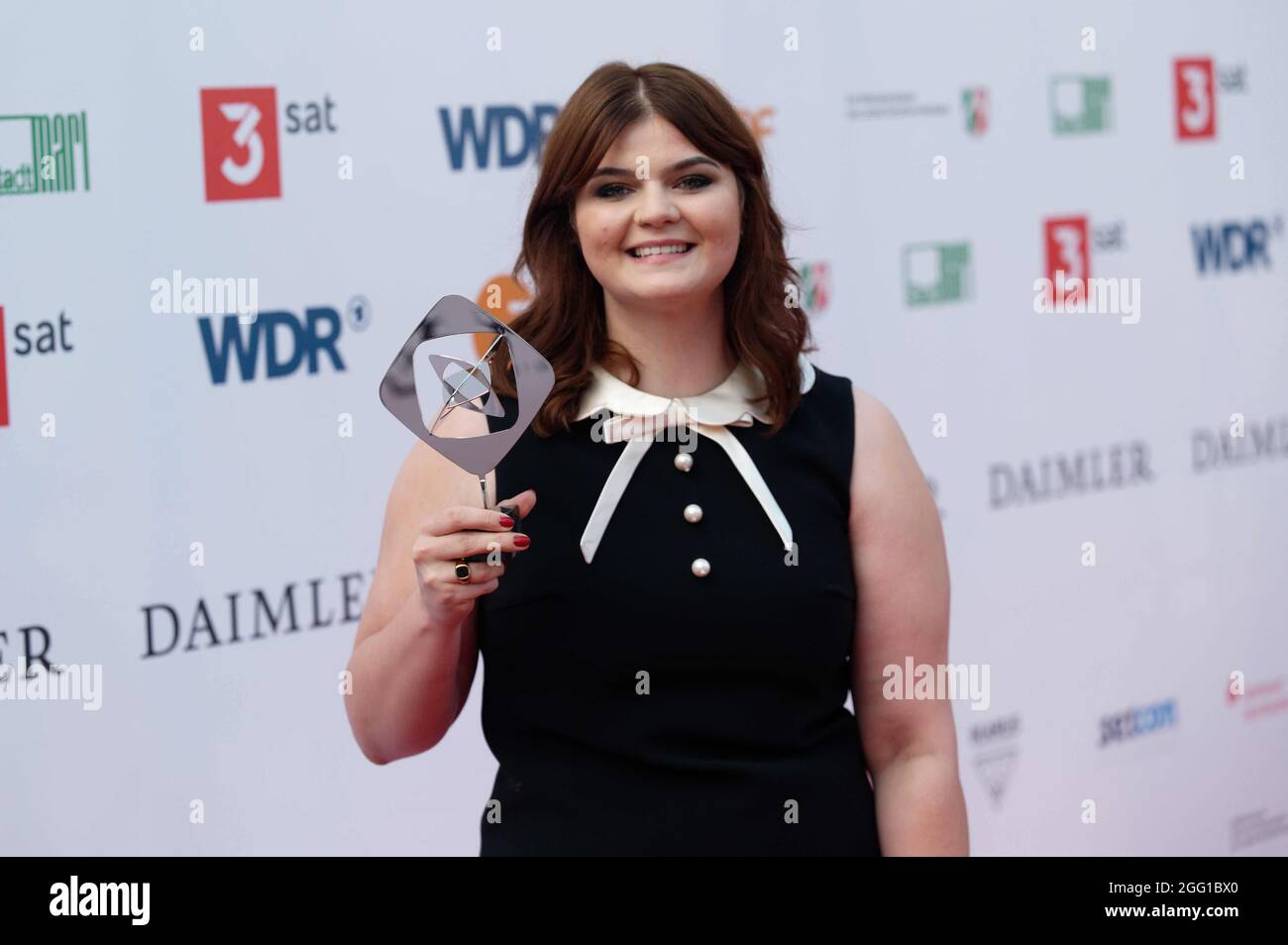Marl, Germany. 27th Aug, 2021. Presenter Sophie Passmann holds the ...