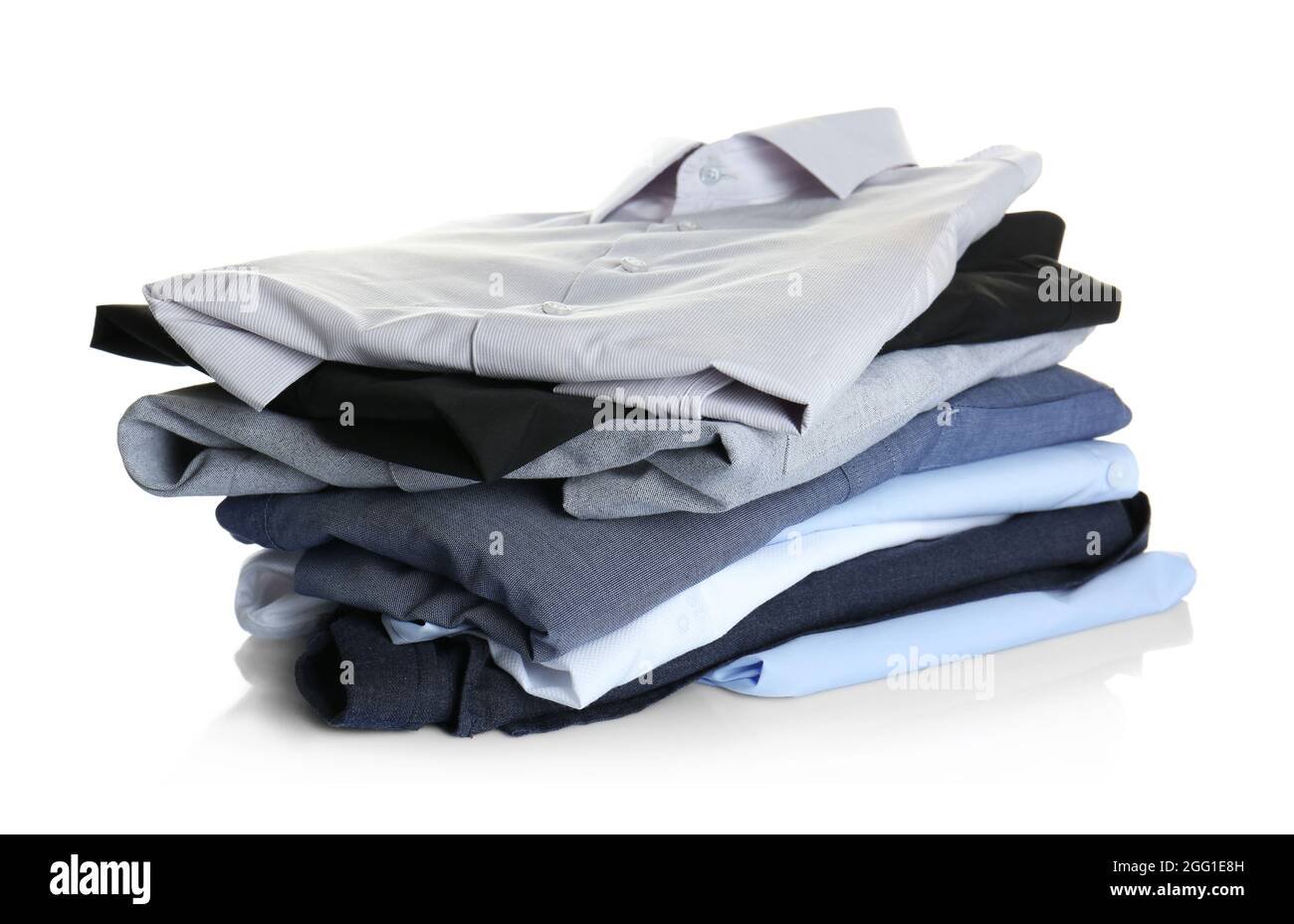 Clean clothes from dry-cleaning on white background Stock Photo - Alamy