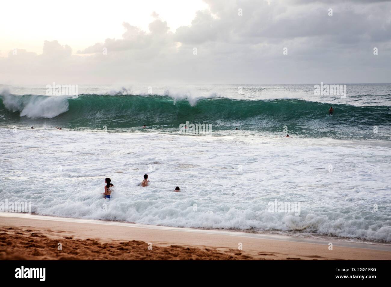 People swimming in the ocean on Oahu Island in Hawaii Stock Photo - Alamy