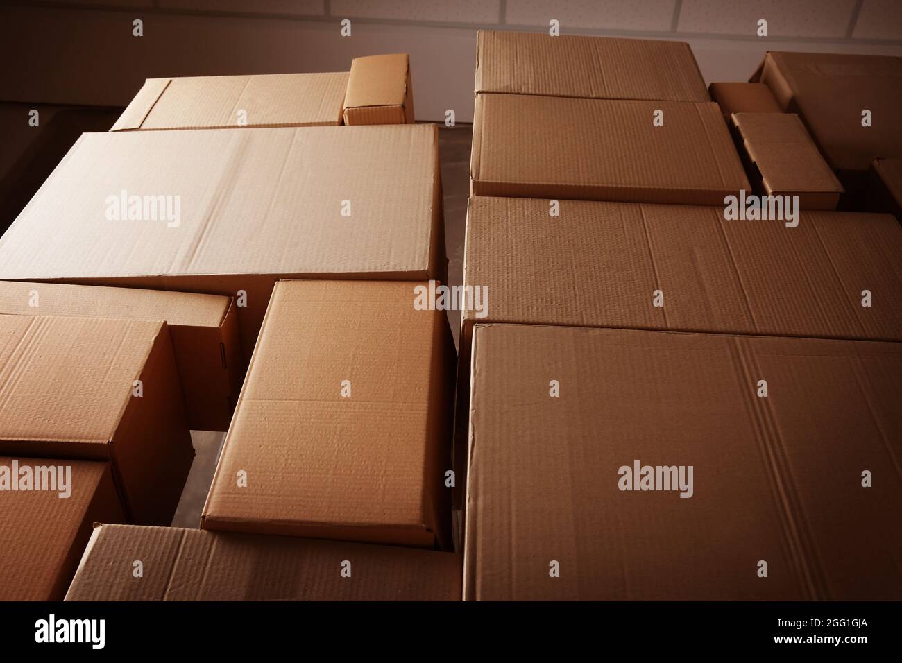 Cardboard boxes as background Stock Photo - Alamy
