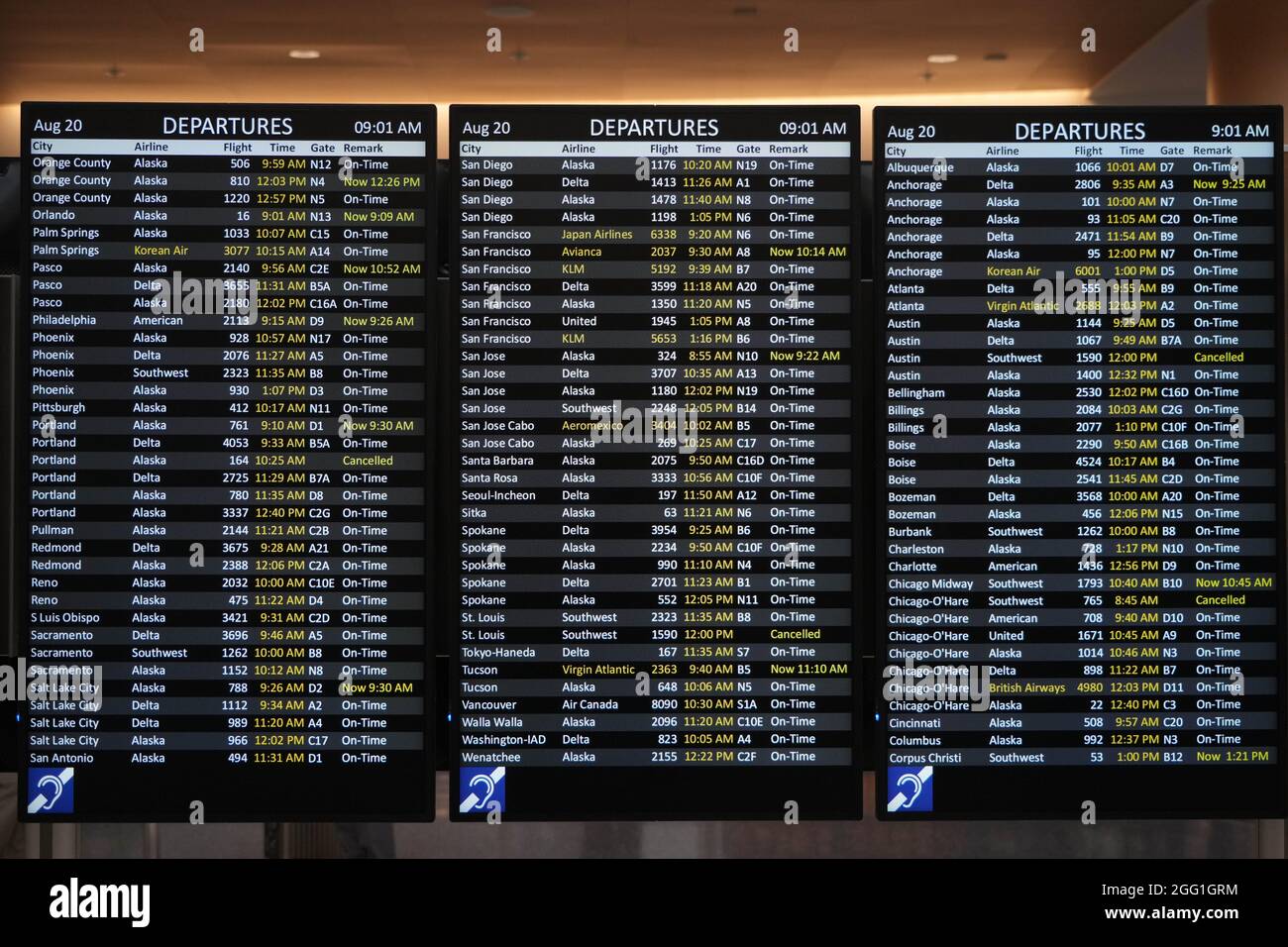 The departures board at the North Terminal of the Seattle-Tacoma ...
