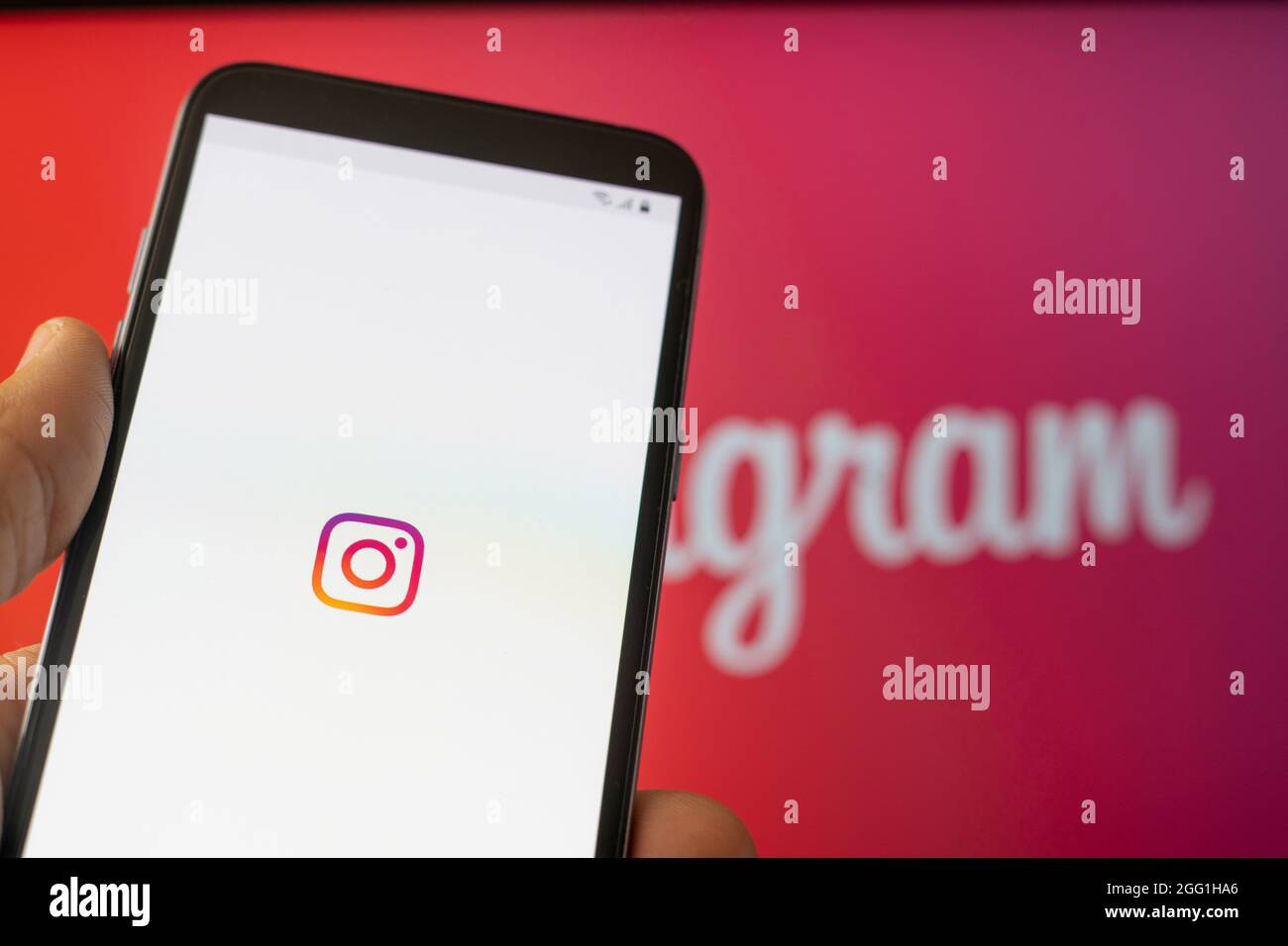 Phone showing Instagram app on the screen. Instagram is a photo and ...