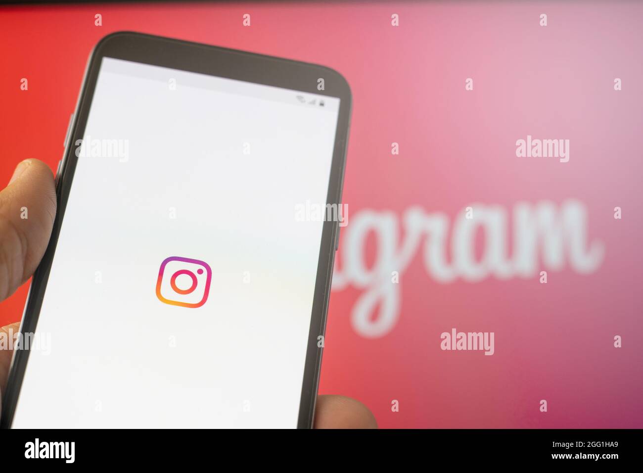 Phone showing Instagram app on the screen. Instagram is a photo and ...