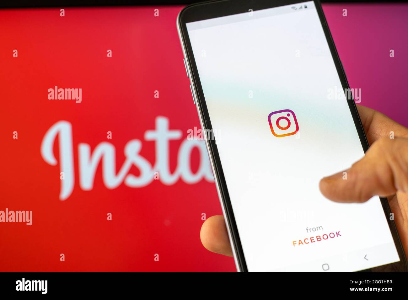 Phone showing Instagram app on the screen. Instagram is a photo and ...