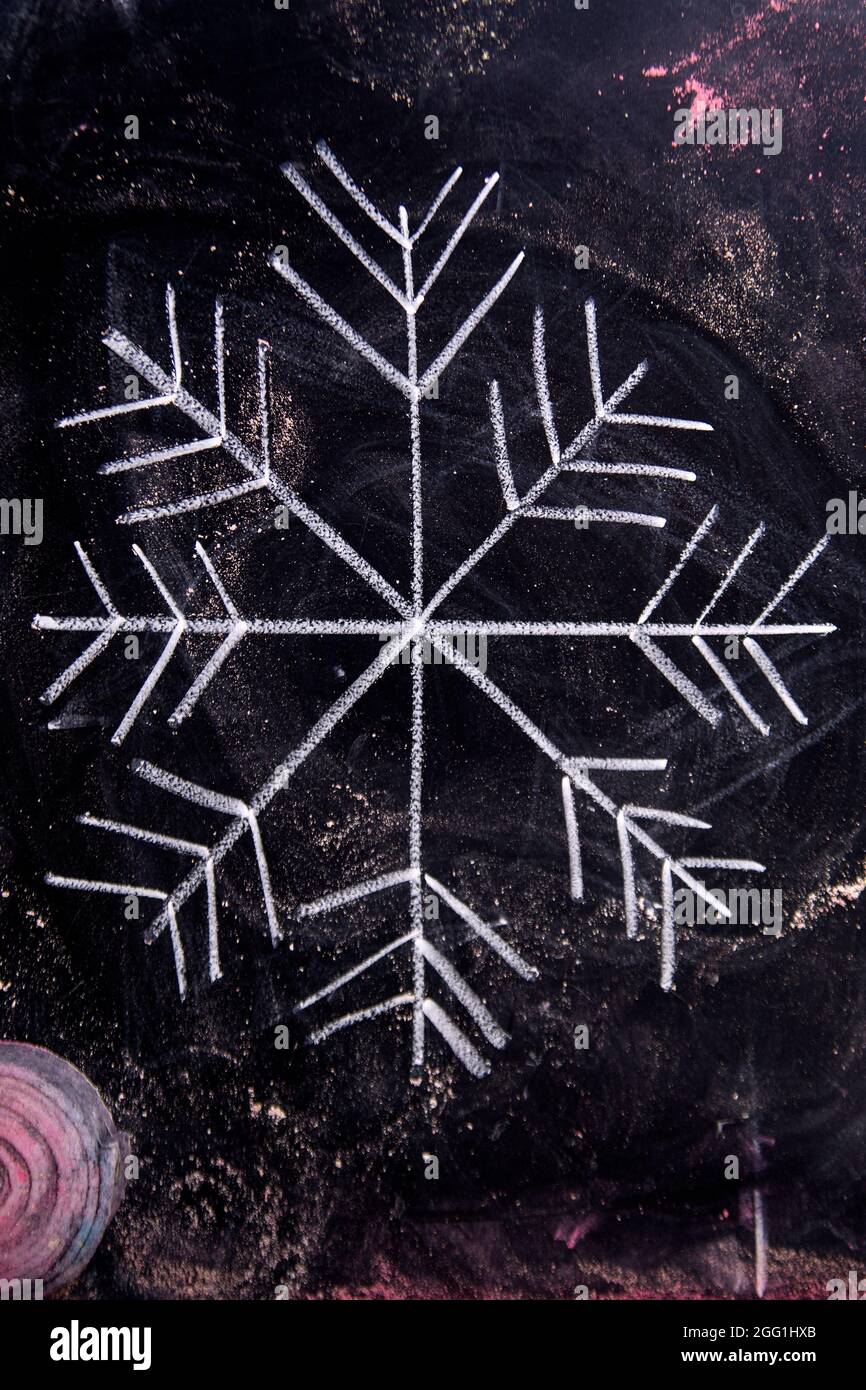 Graphic representation with chalk on blackboard symbol of snow Stock ...