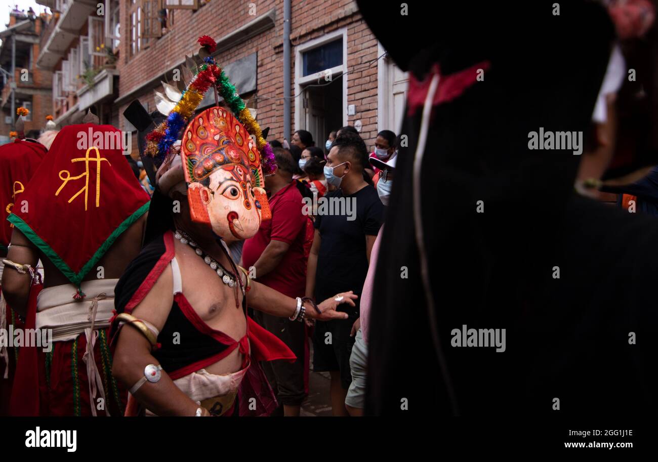 2nd August 2021. Bhaktapur, Nepal. A traditional masked dancer performs ...