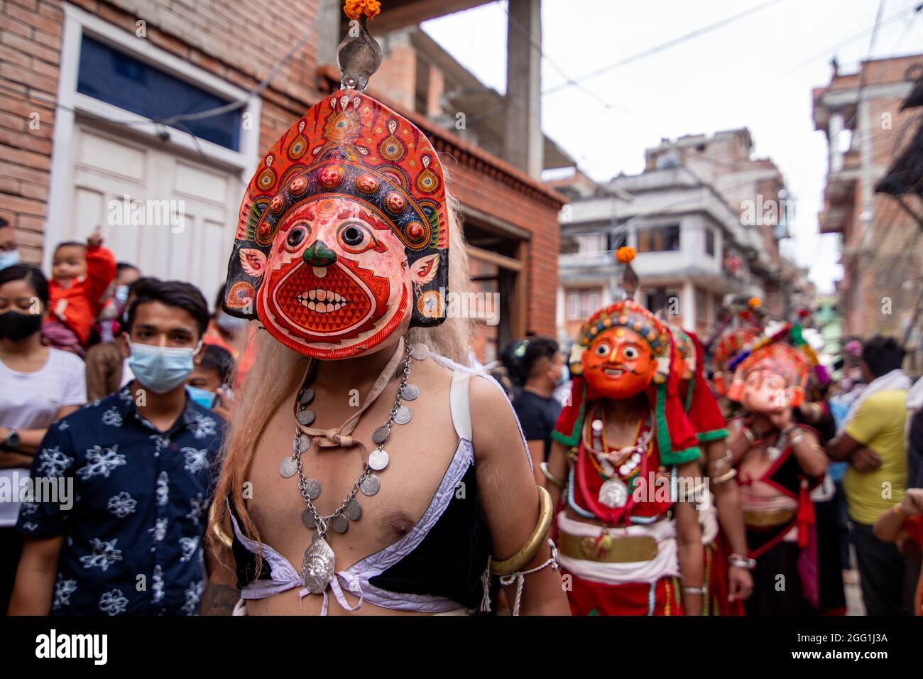 2nd August 2021. Bhaktapur, Nepal. A traditional masked dancer performs ...