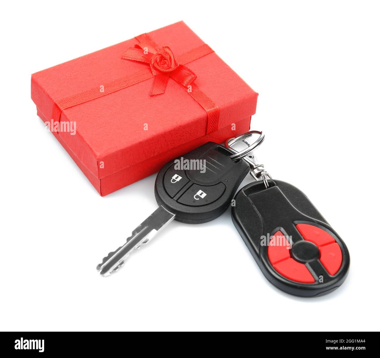 Car keys and gift box on white background Stock Photo - Alamy