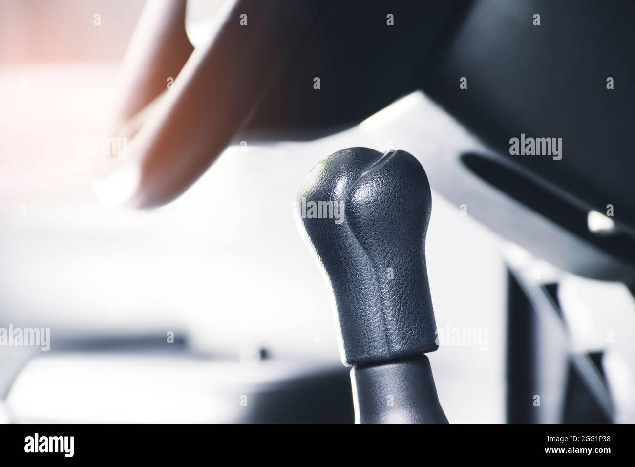 Gear lever isolated in the car with sunlight Stock Photo - Alamy