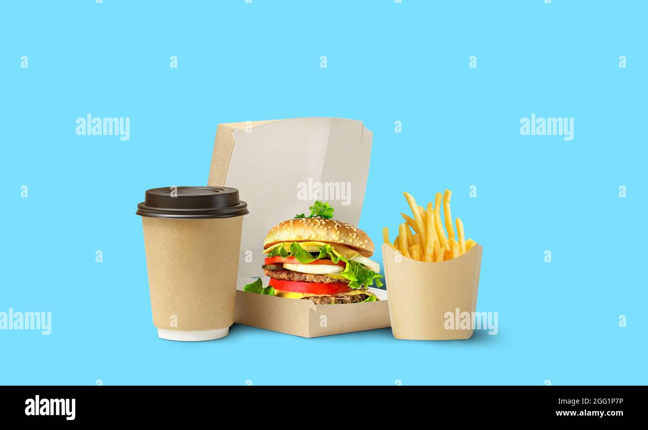 Fast food lunch delivery. Tasty Hamburger, fries and coffee in ...