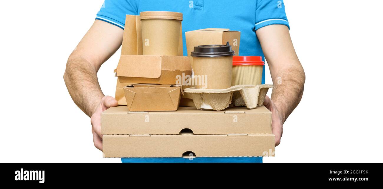Fast food delivery. Delivery man is carrying diverse of paper ...