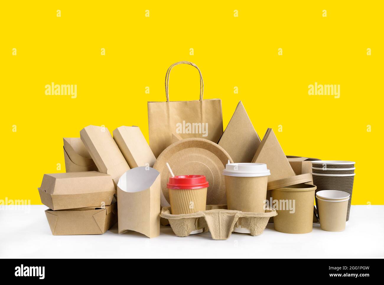 Fast food packaging set on yellow background Stock Photo - Alamy