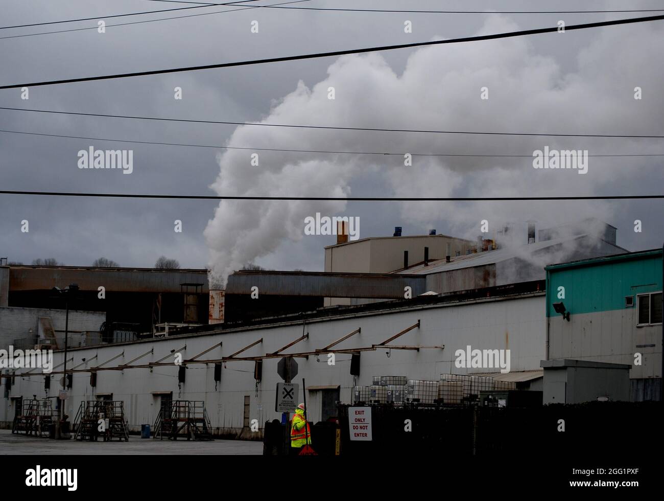 Smokestacks in the industrial area Stock Photo - Alamy