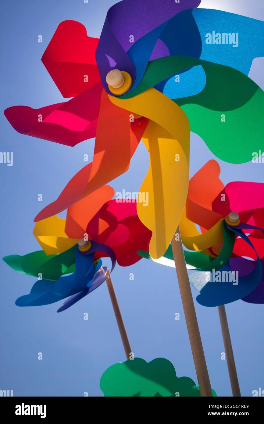 Small colored windmills in paper that you/they turn for the wind Stock ...