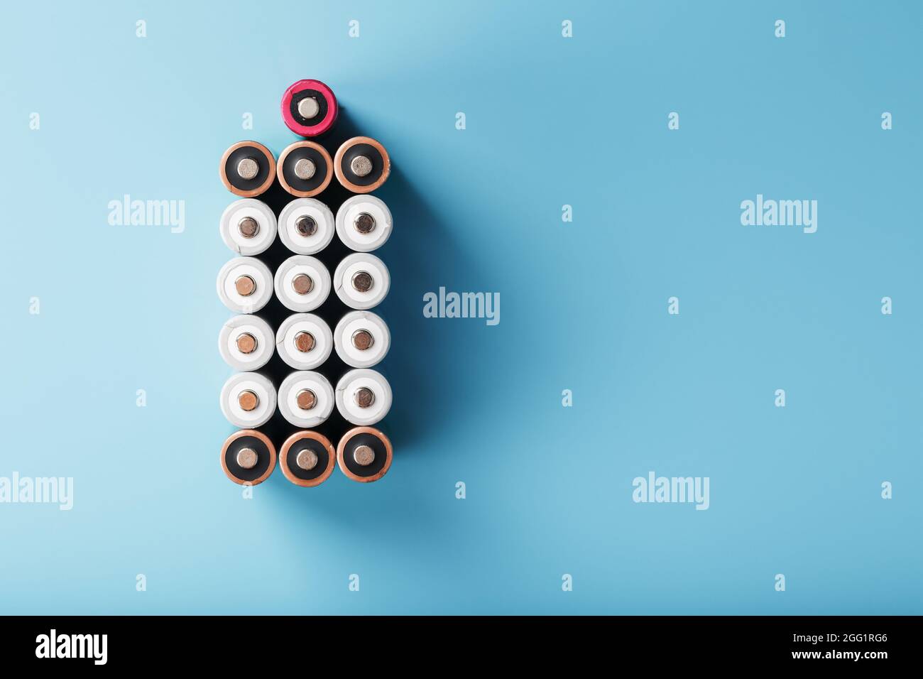 AA finger batteries in the form of a large battery on a blue background ...