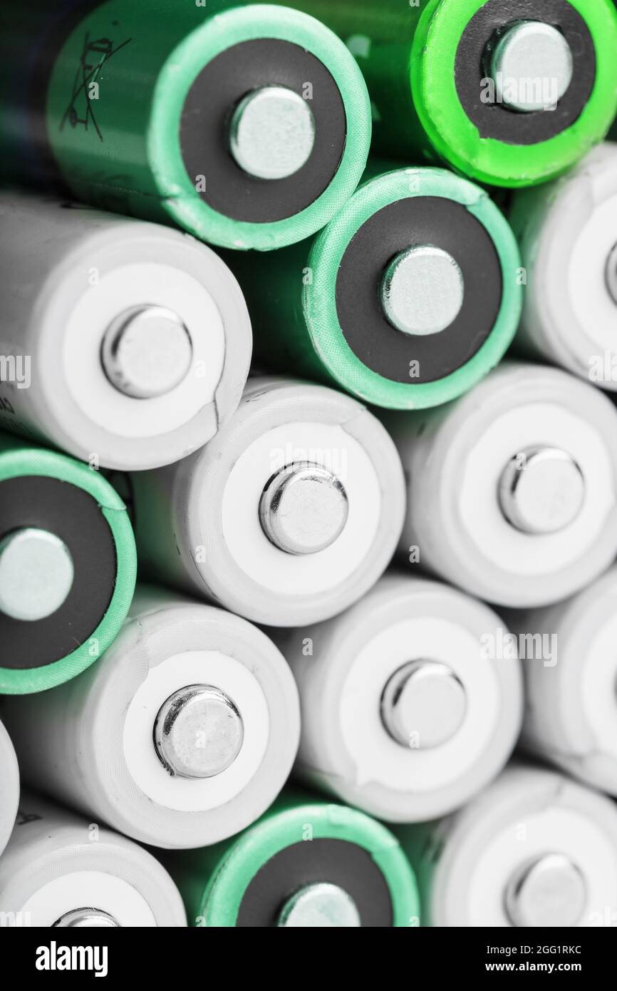 AA batteries as a texture background in full screen. The concept of ...