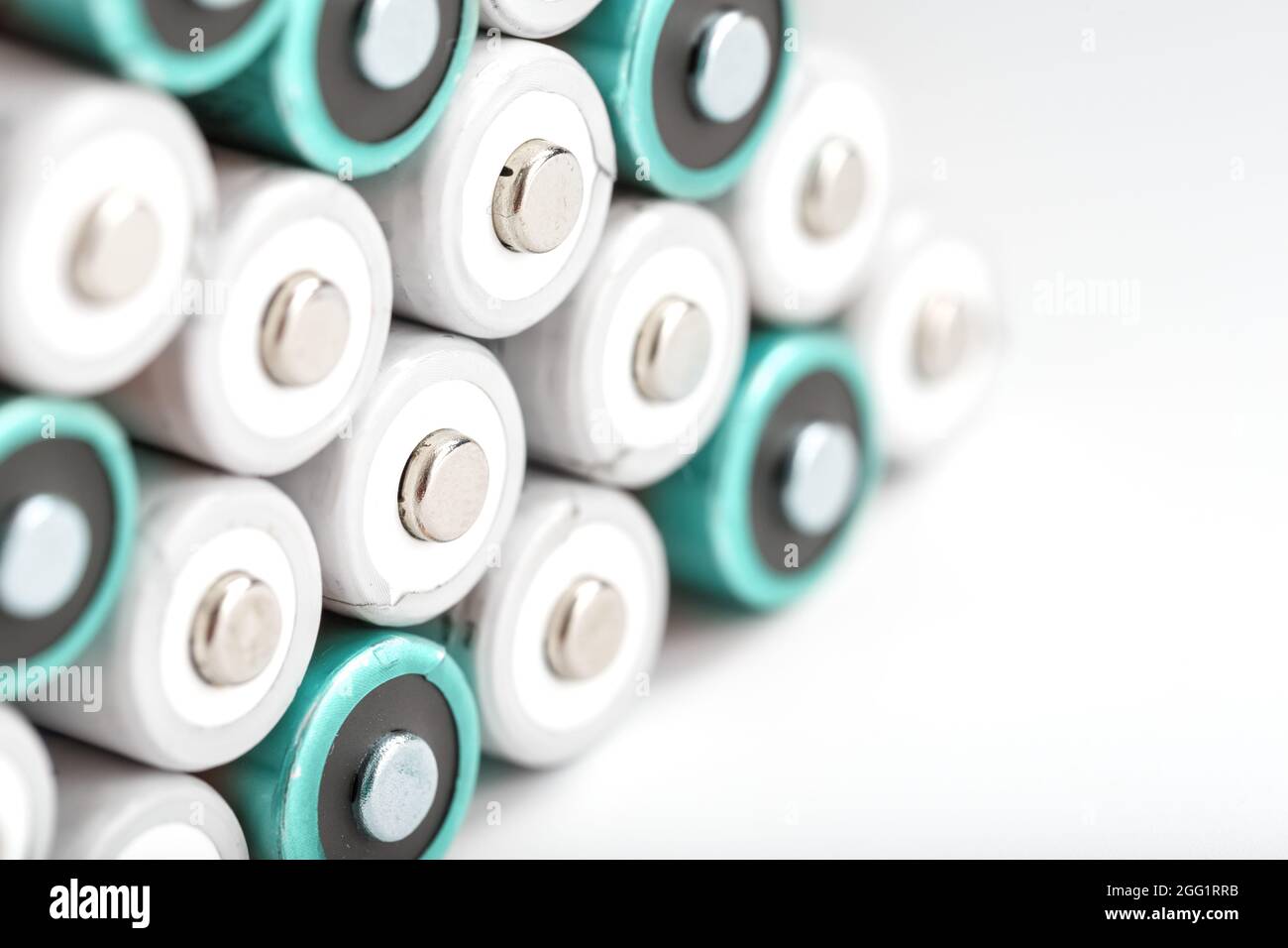 Batteries and AAA batteries are a pyramid on a white background with ...