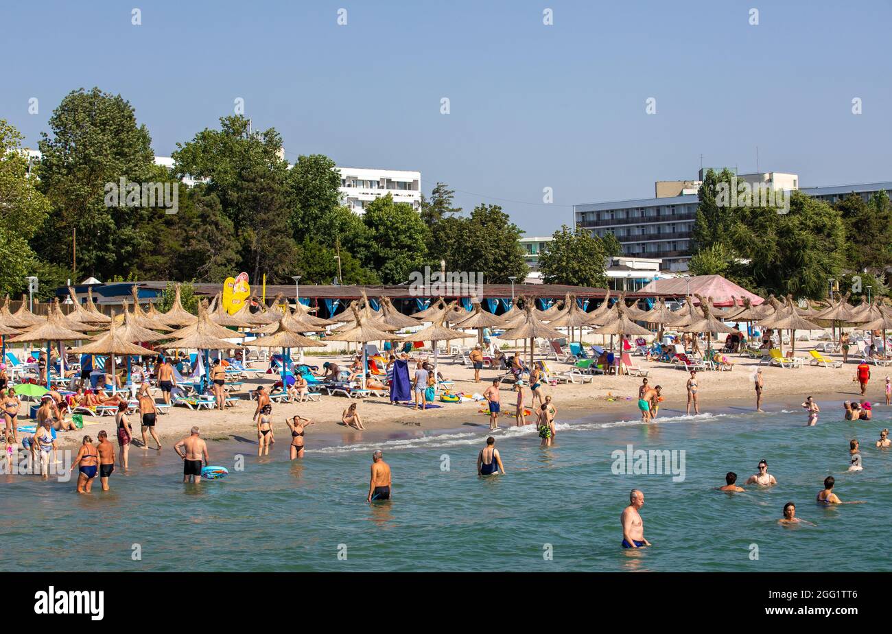 SATUR, ROMANIA - Aug 02, 2021: The tourists in the Black Sea and on the ...