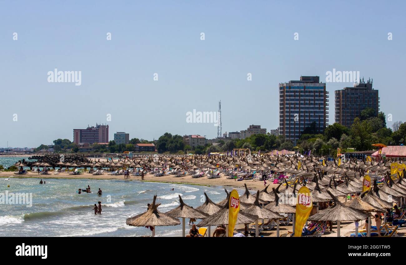 MANGALIA, ROMANIA - Aug 02, 2021: The tourists in the Black Sea and on ...