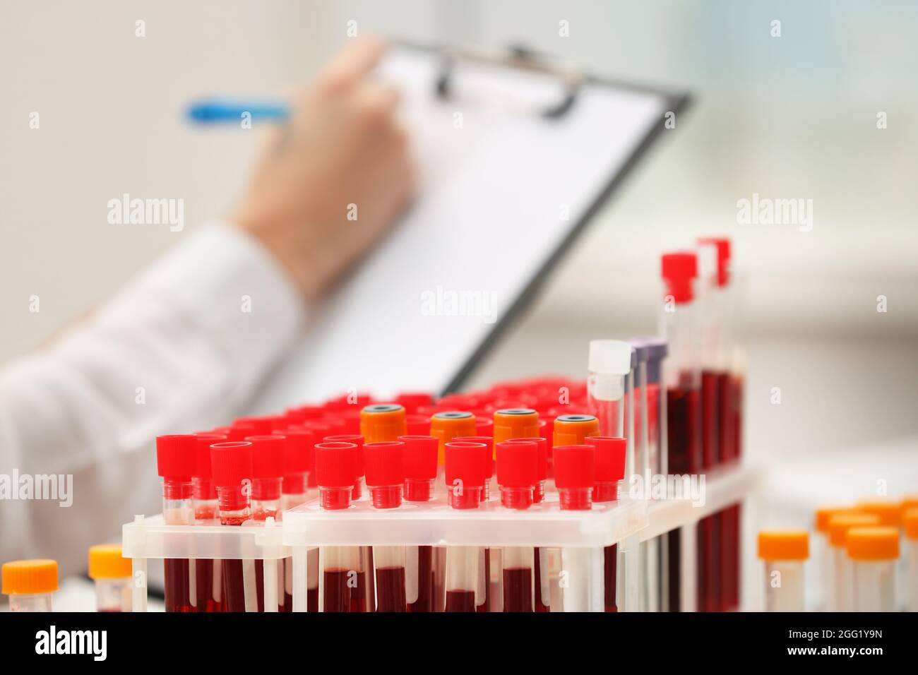 Test tubes filled with blood in laboratory Stock Photo - Alamy