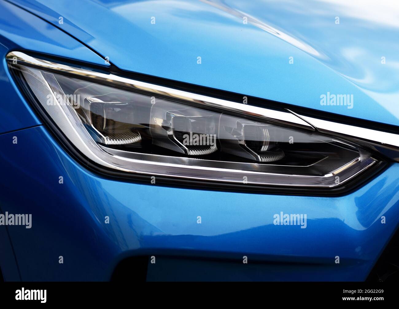 Headlight. LED headlamp of a modern car. Frontal lighting of highway ...