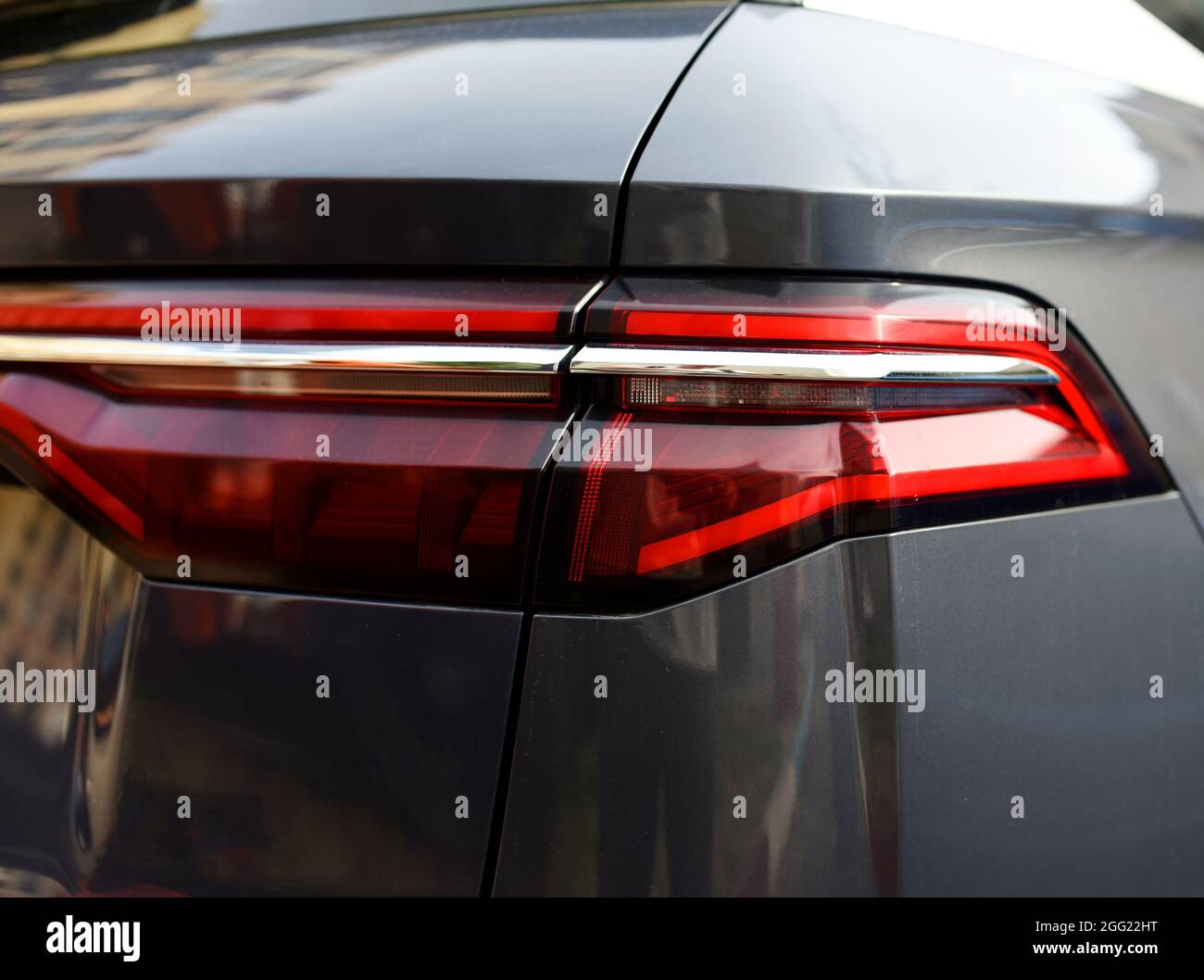 Rear LED headlamp of a modern car. Brake taillight. Red stop lighting ...