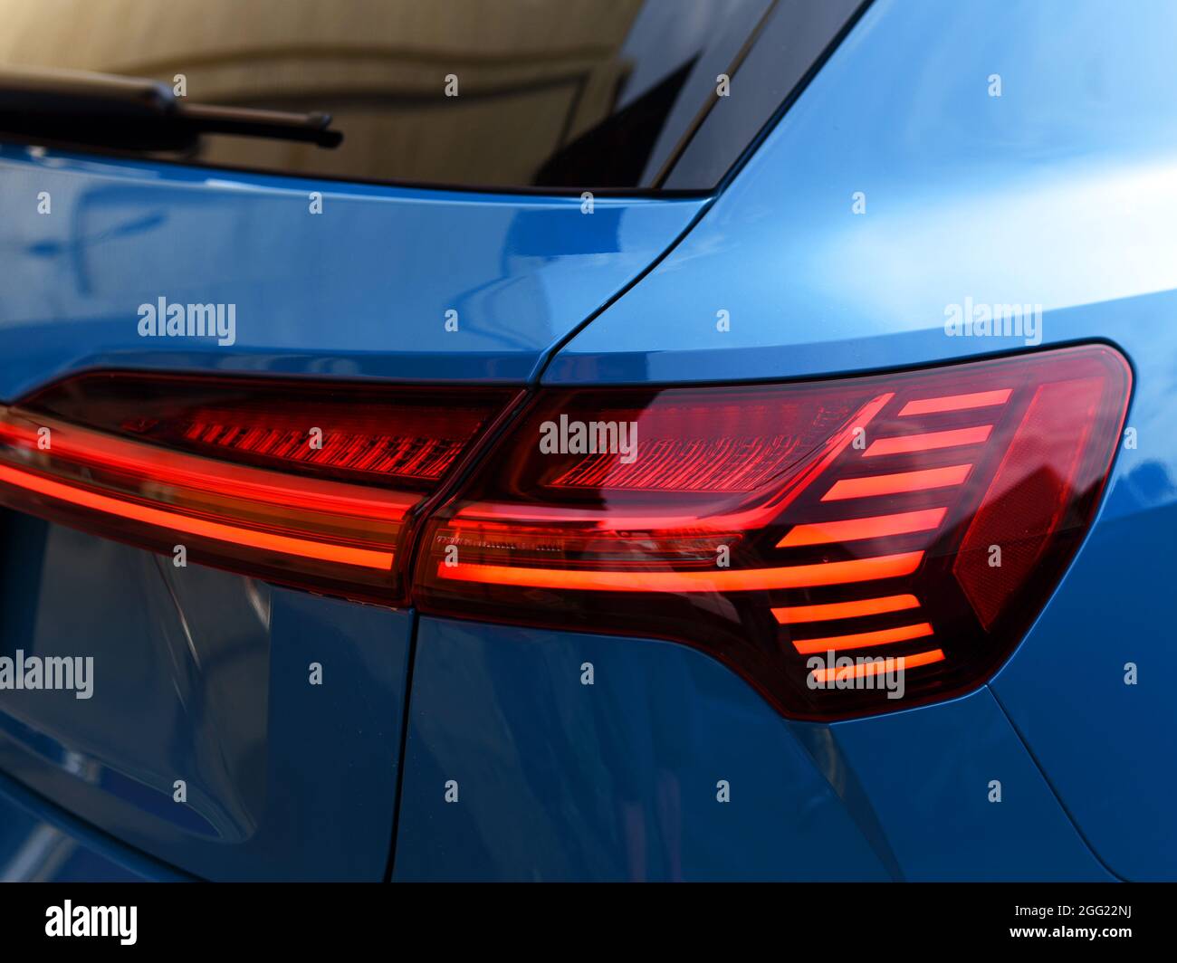 Rear LED headlamp of a modern car. Brake taillight. Red stop lighting ...