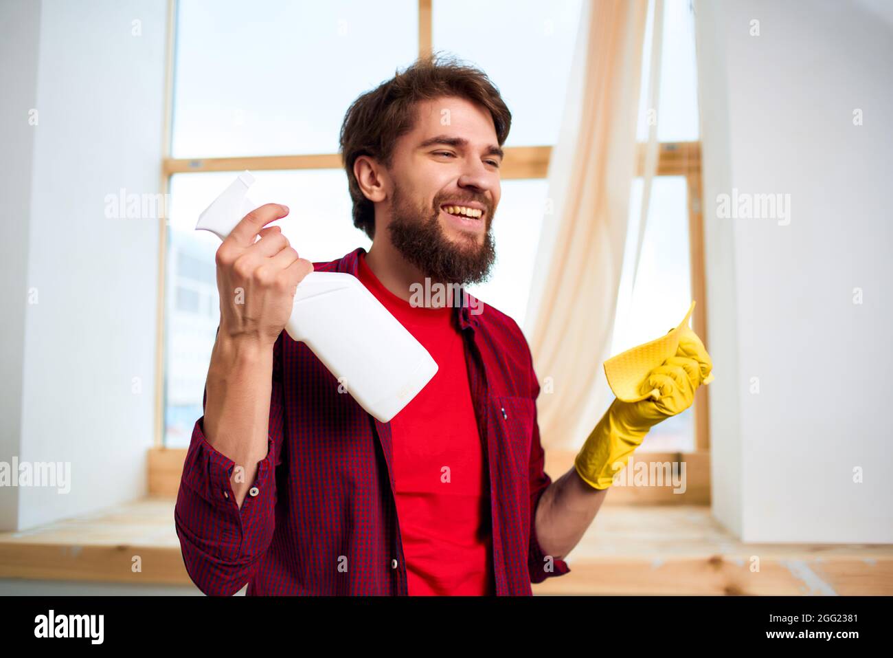 housekeeper cleaning the apartment routine work Stock Photo - Alamy