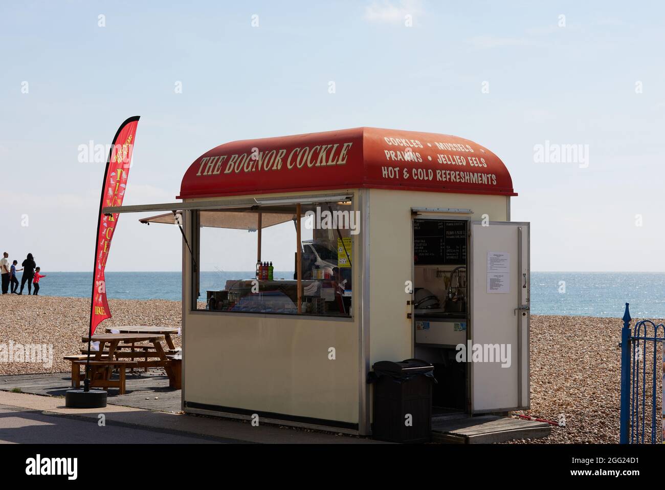 Small shop unit seen along the beach in summer Stock Photo - Alamy