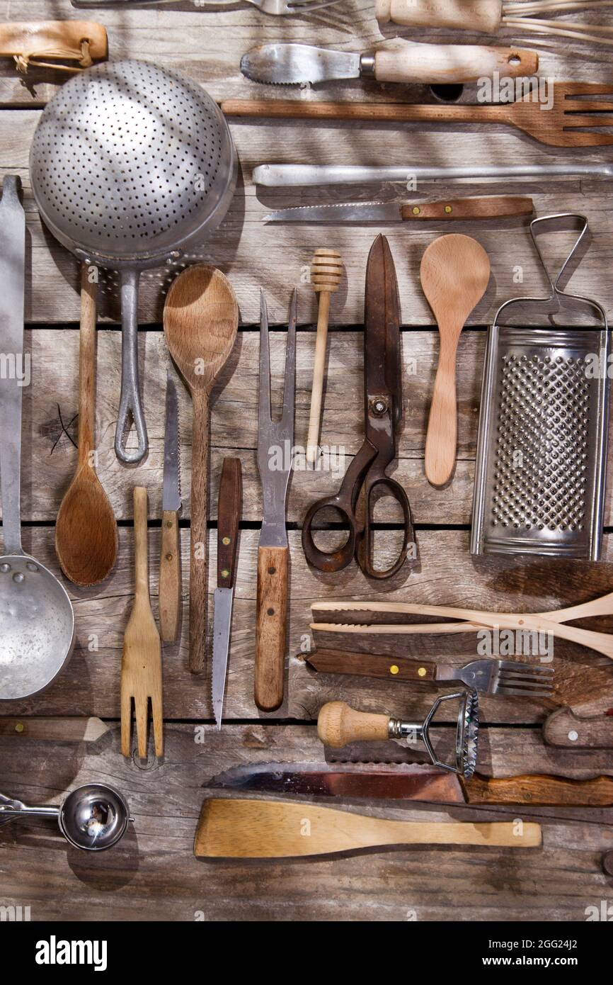 Old and various accessories for the preparation of food Stock Photo - Alamy
