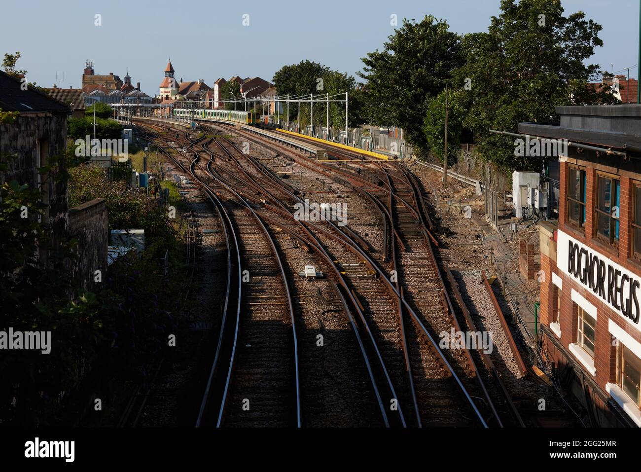 Bognor Regis railway station with tracks and trains during the day in ...