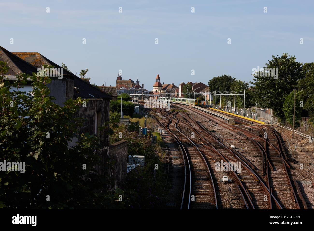 Bognor Regis railway station with tracks and trains during the day in ...