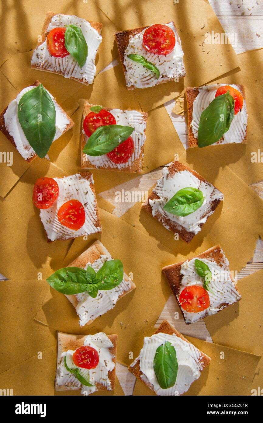 Tricolor cocktail canapes, cheese and tomato salad Stock Photo - Alamy