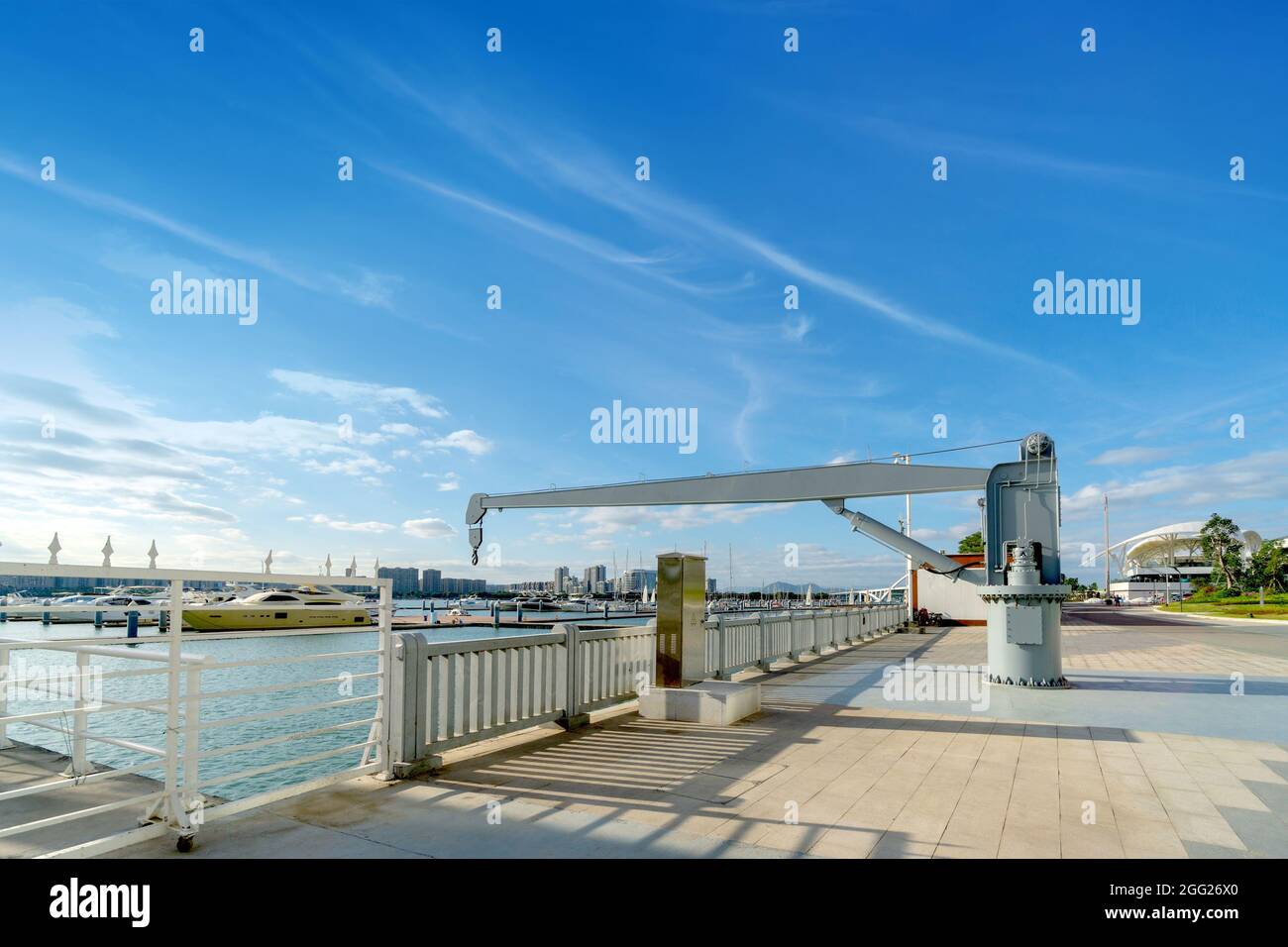 single boom crane on the dock Stock Photo - Alamy