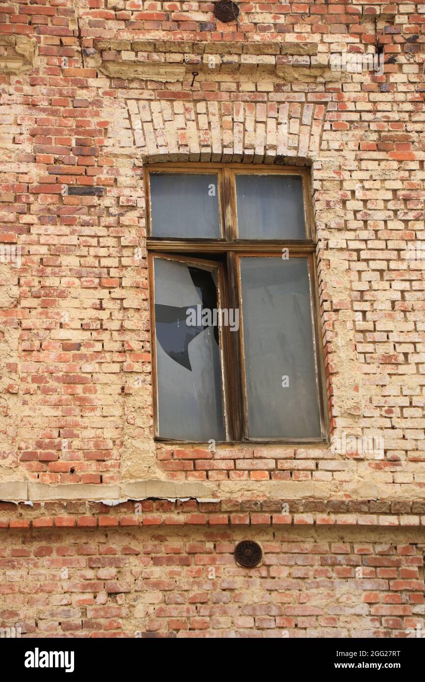 Broken windows in an old brick facade in Görlitz Stock Photo - Alamy