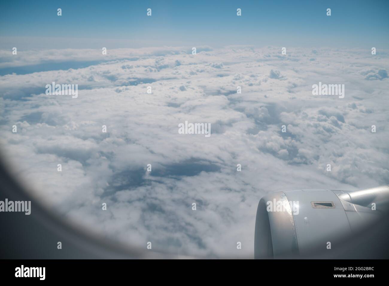 Plane turbine and wing behind window Stock Photo - Alamy