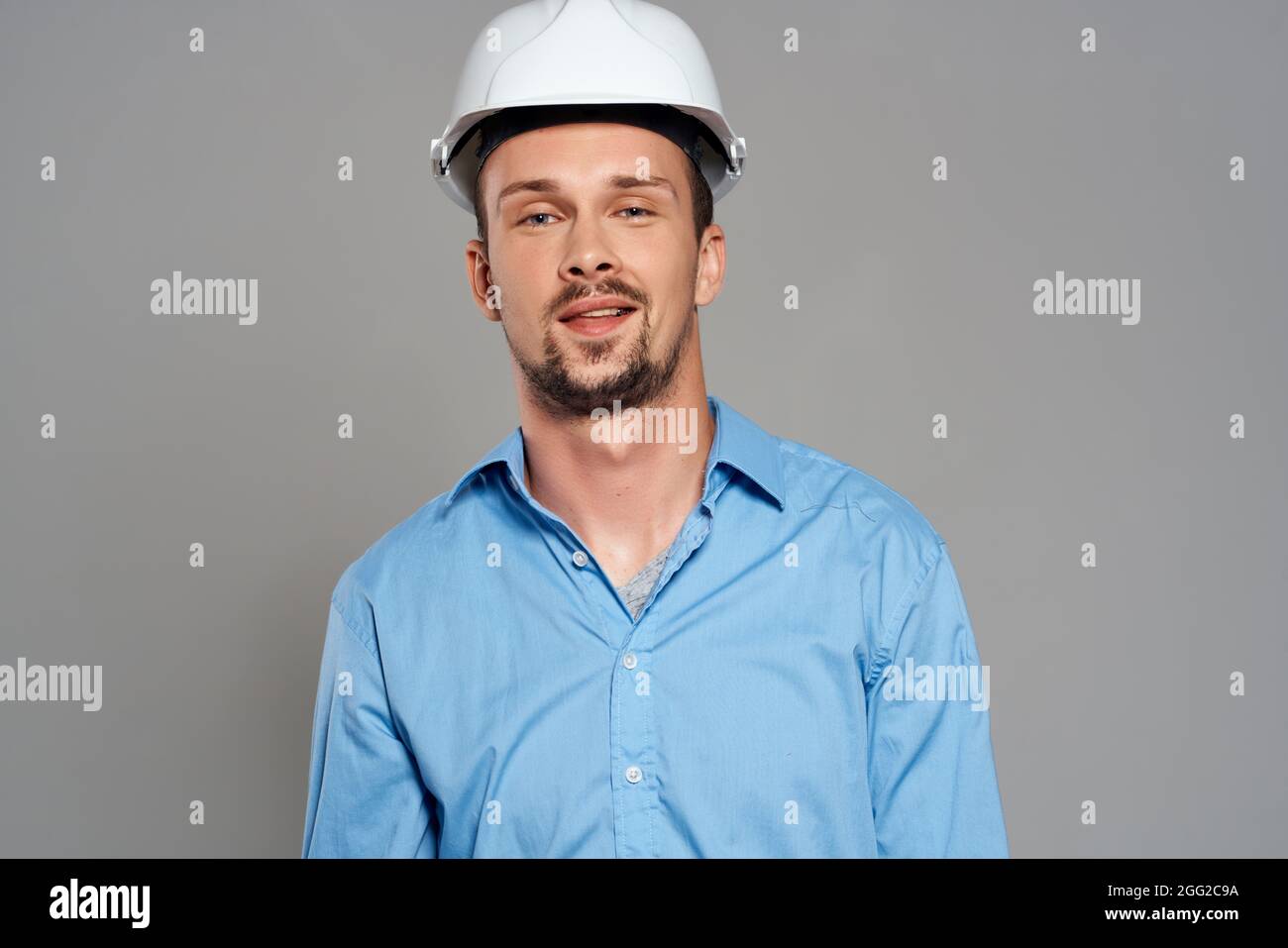 man in working uniform white construction helmet safety professional ...