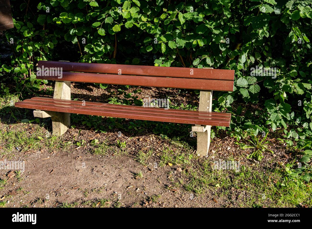 Wooden bench side road hi-res stock photography and images - Alamy