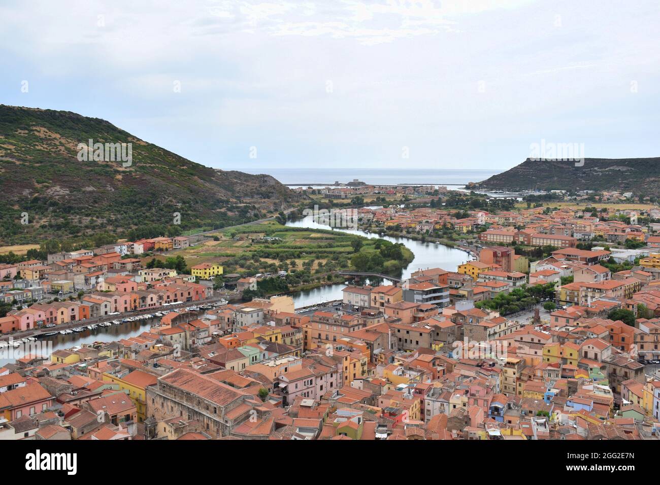 Winding Temo river flows to the mediterranean sea through Bosa ...