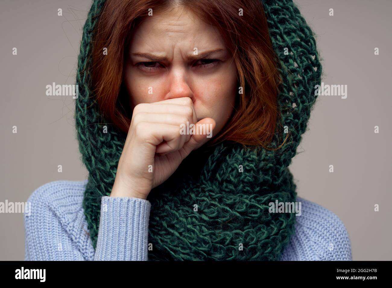 sick woman cold red nose disorder isolated background Stock Photo - Alamy