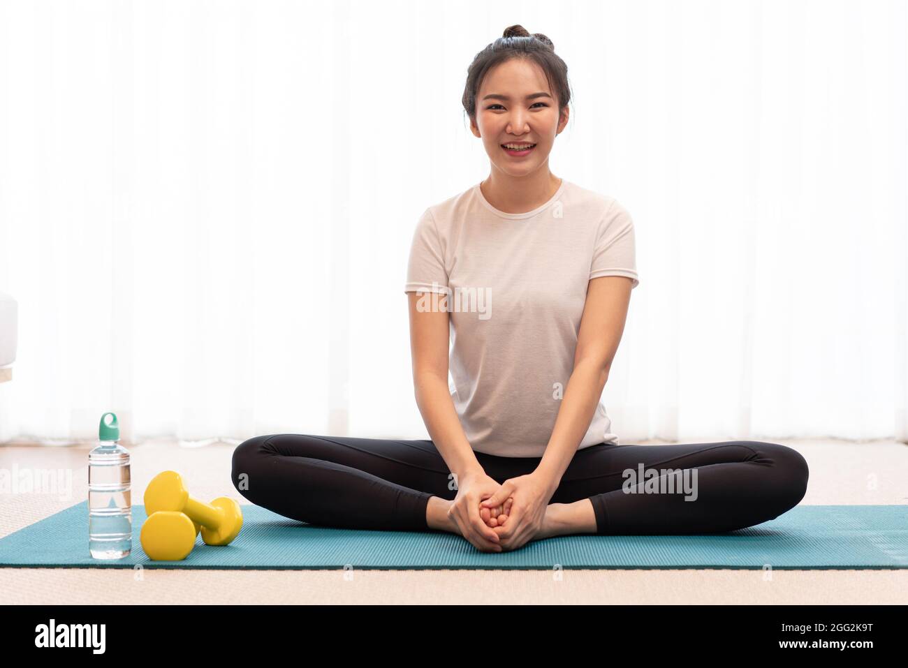 Productive activity concept a girl with a bun sitting on the ...