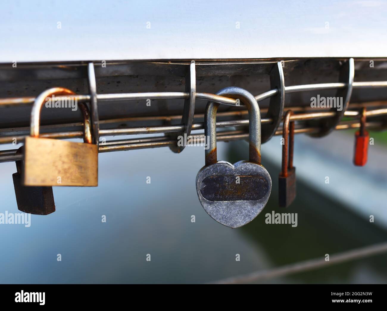 Padlock on Lovers Lock Bridge. Husband and wife during the wedding hung ...