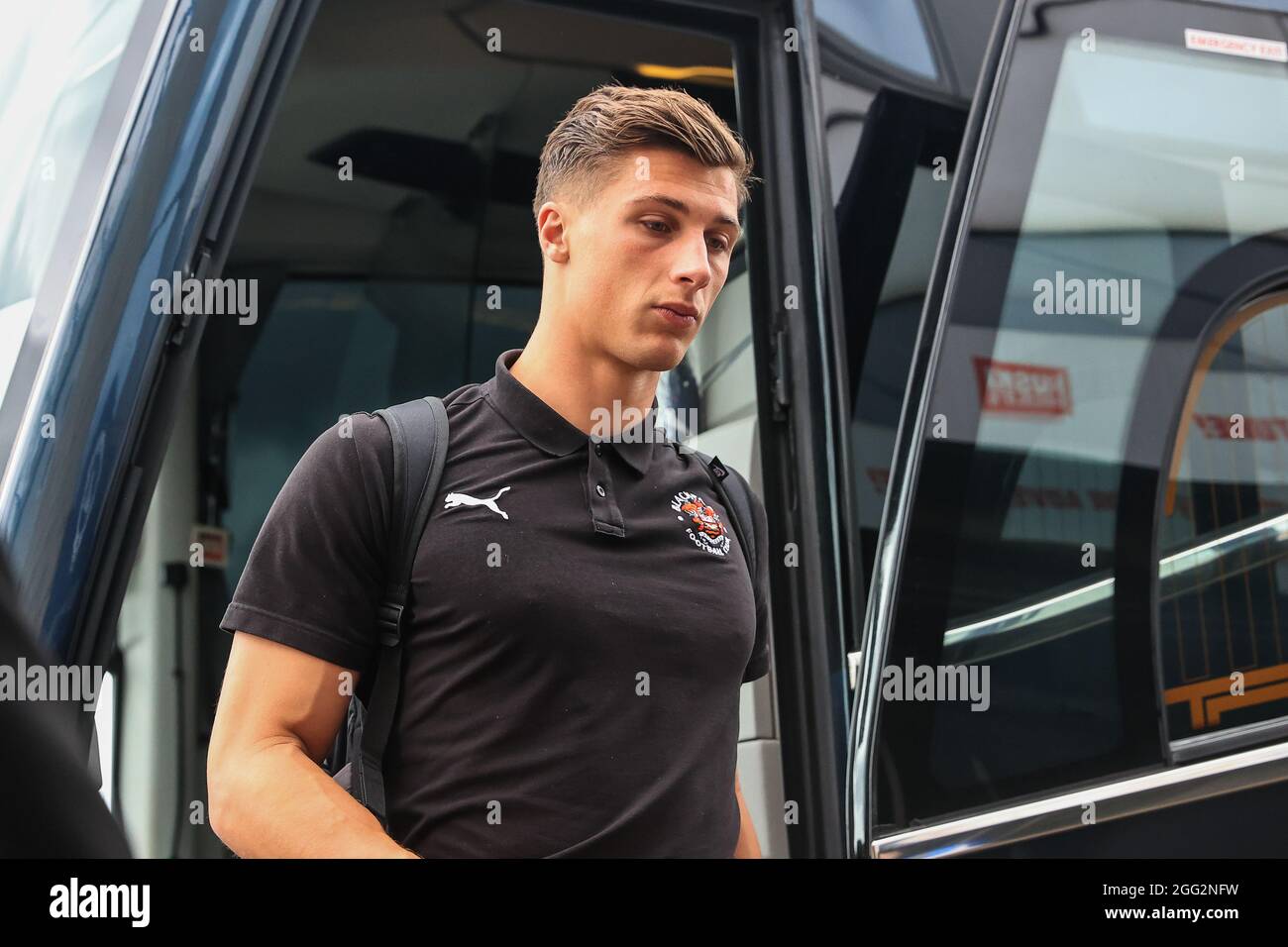 Stuart Moore #13 of Blackpool arrives at The Den Stock Photo - Alamy