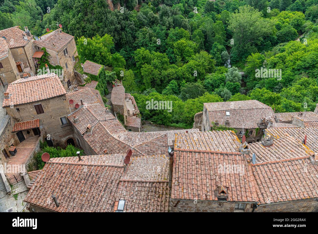 picturesque view of Sorano with old staircase, alley, underpass and ...