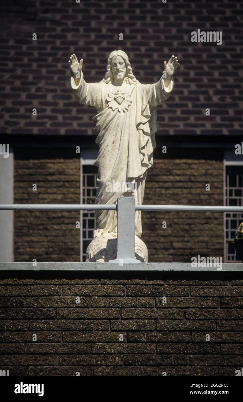 Jesus statue in a church yard on Achill Island, County Mayo Stock Photo ...