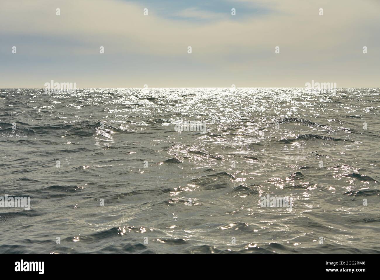 Horizon sea with waves after storm. sparkler in water - background. sea ...