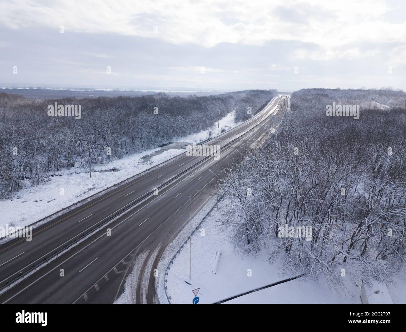 Winter Driving - commuter traffic on a highway - expressway - snowfall ...